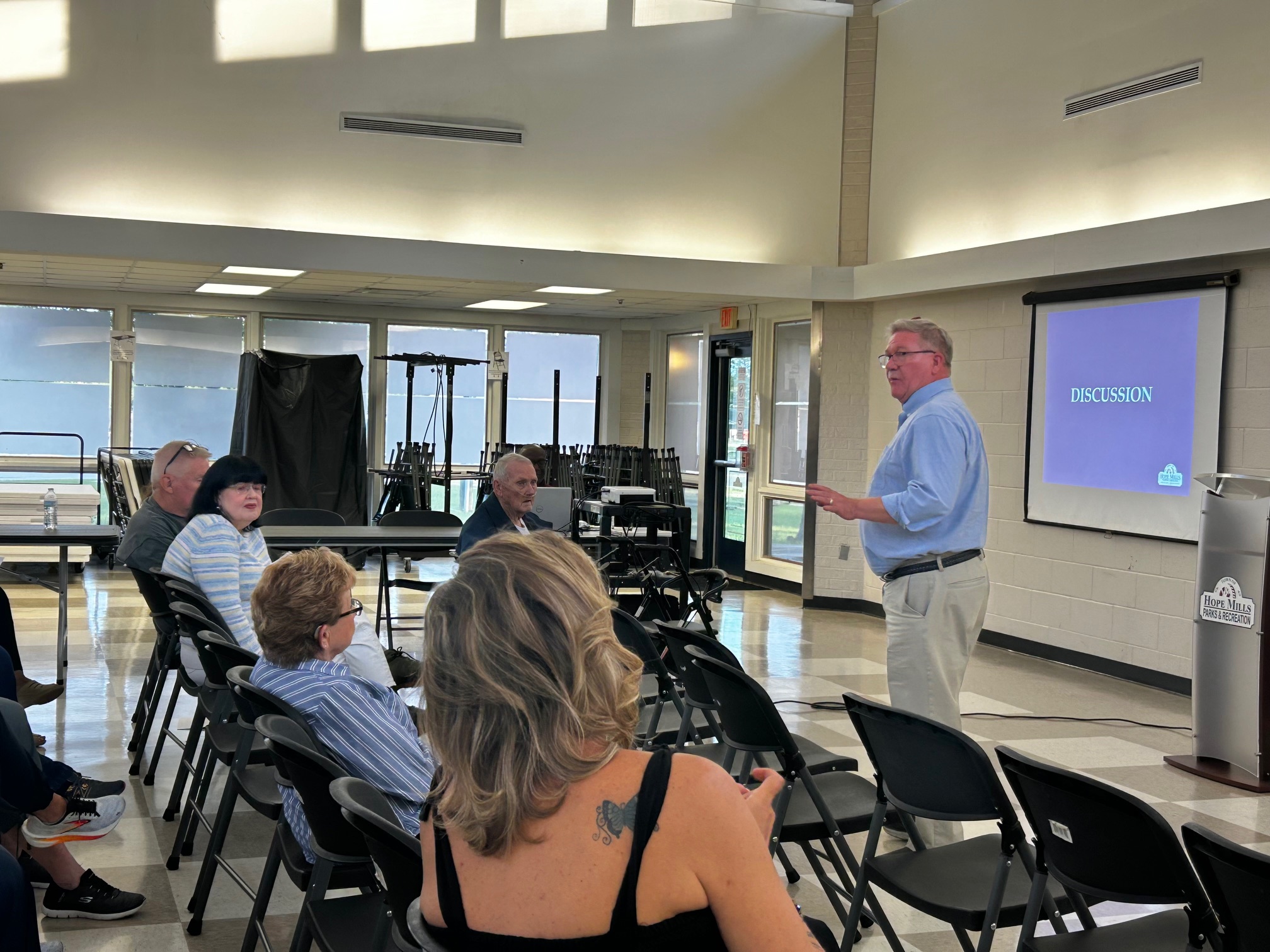 Hope Mills Mayor Jessie Bellflowers listens to citizens in town hall